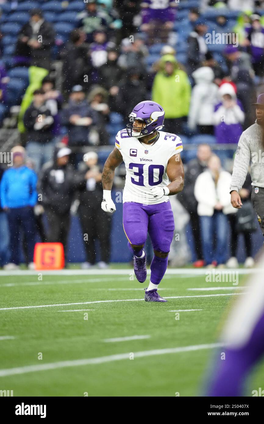 Minnesota Vikings fullback C.J. Ham (30) runs down the field before an ...