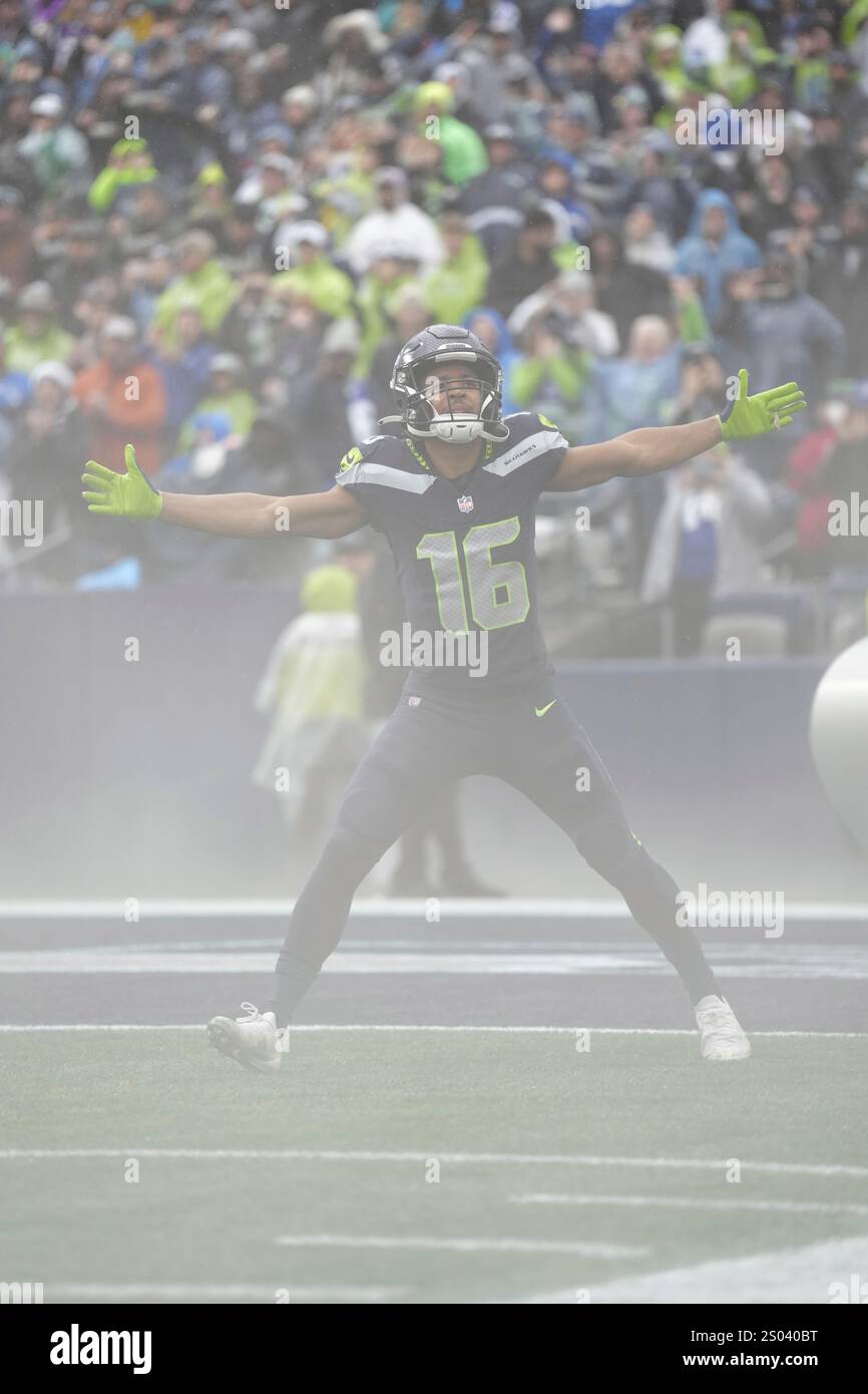 Seattle Seahawks wide receiver Tyler Lockett (16) runs onto the field ...