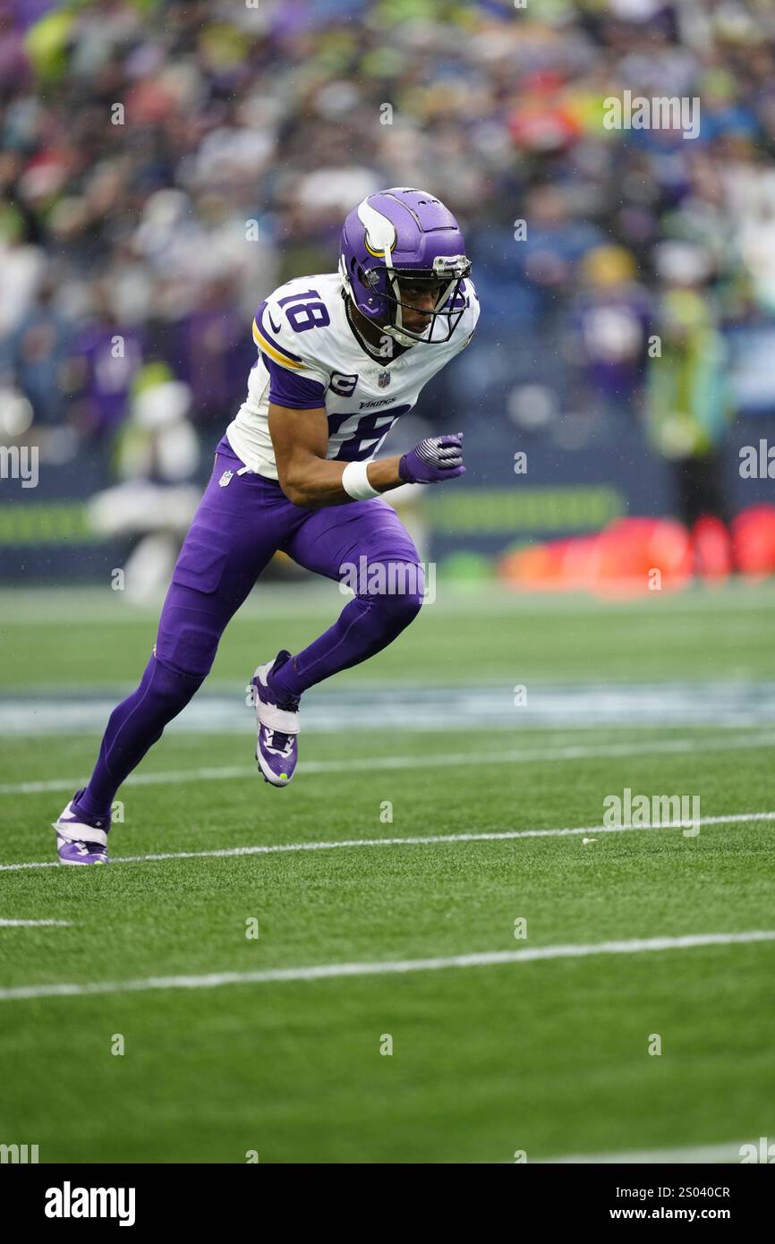 Minnesota Vikings wide receiver Justin Jefferson (18) runs down the ...