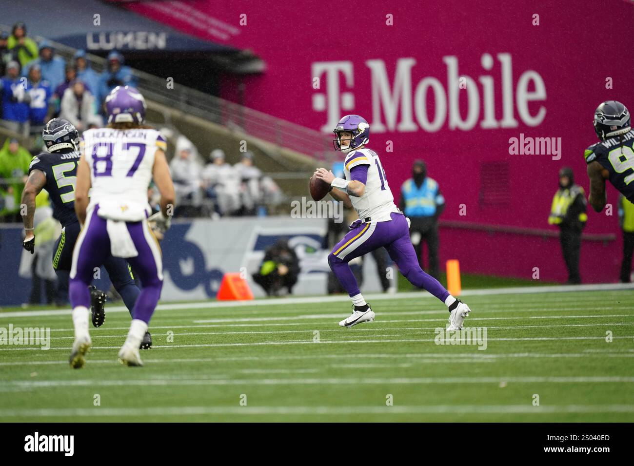 Minnesota Vikings quarterback Sam Darnold (14) looks to throw the ball during an NFL football ...