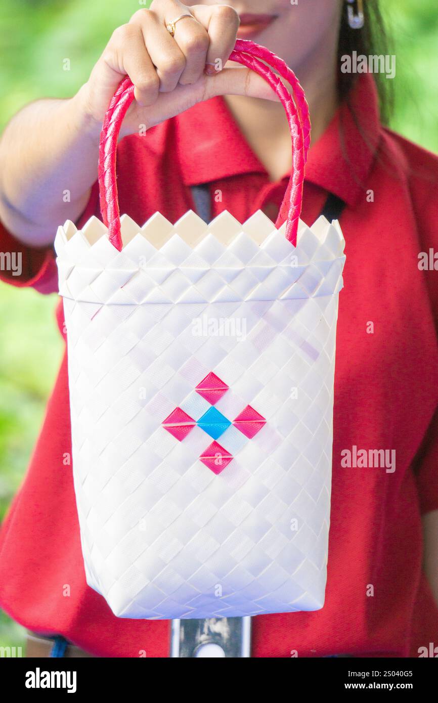 Create bags from woven plastic. Activities to reduce plastic waste ...