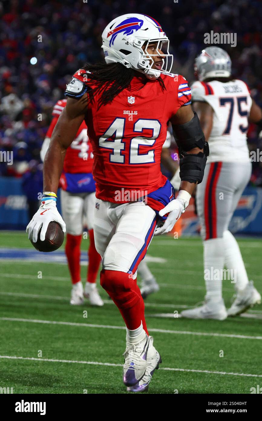 Buffalo Bills linebacker Dorian Williams (42) recovers a fumble during ...