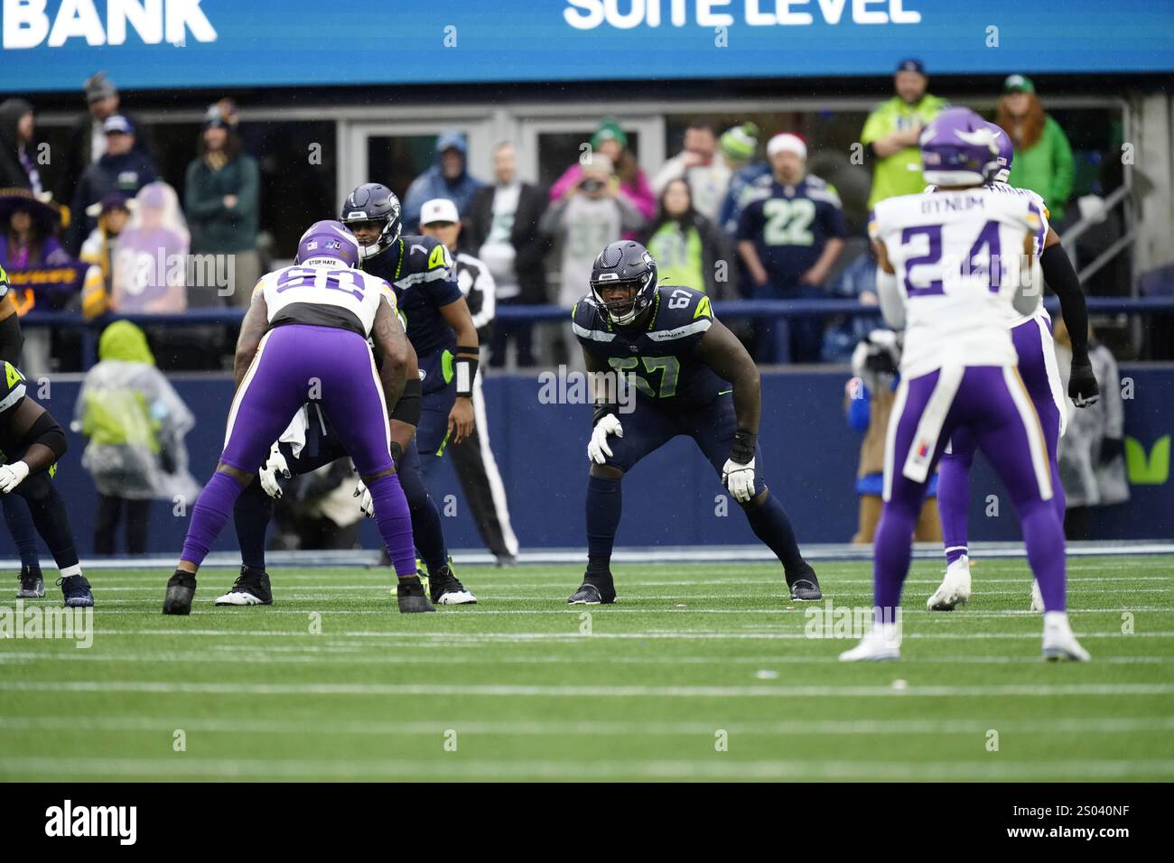 Seattle Seahawks offensive tackle Charles Cross (67) gets set during an ...