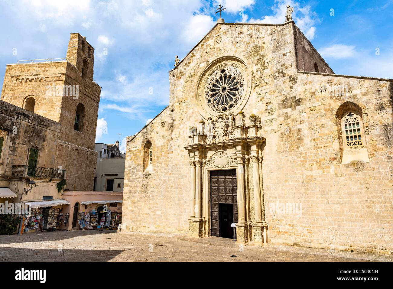 The façade of the Cathedral of Otranto, with statues and rose window ...