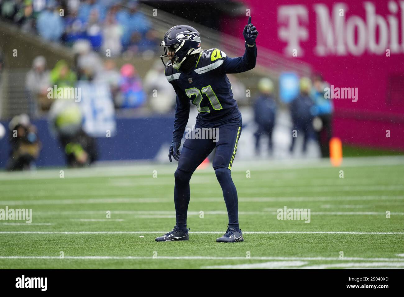 Seattle Seahawks cornerback Devon Witherspoon (21) gets set during an ...