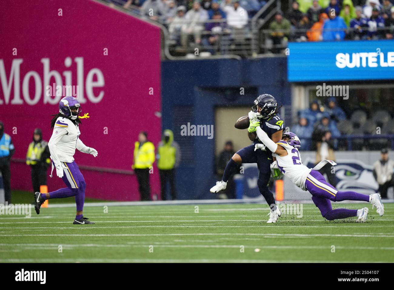 Minnesota Vikings safety Camryn Bynum (24) prevents Seattle Seahawks wide receiver Jaxon Smith ...
