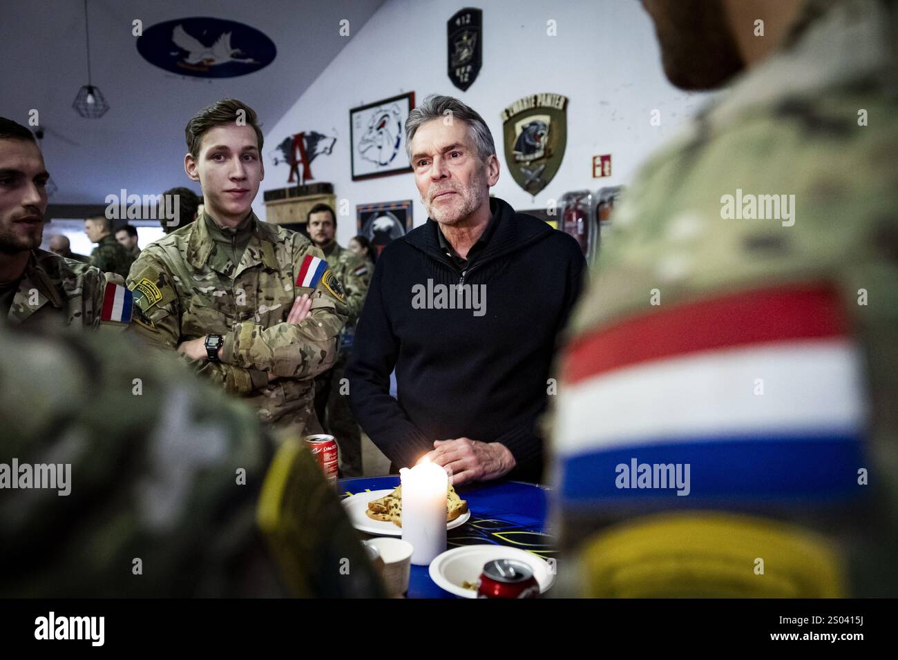 RUKLA - Prime Minister Dirk Schoof talks with Dutch military personnel ...