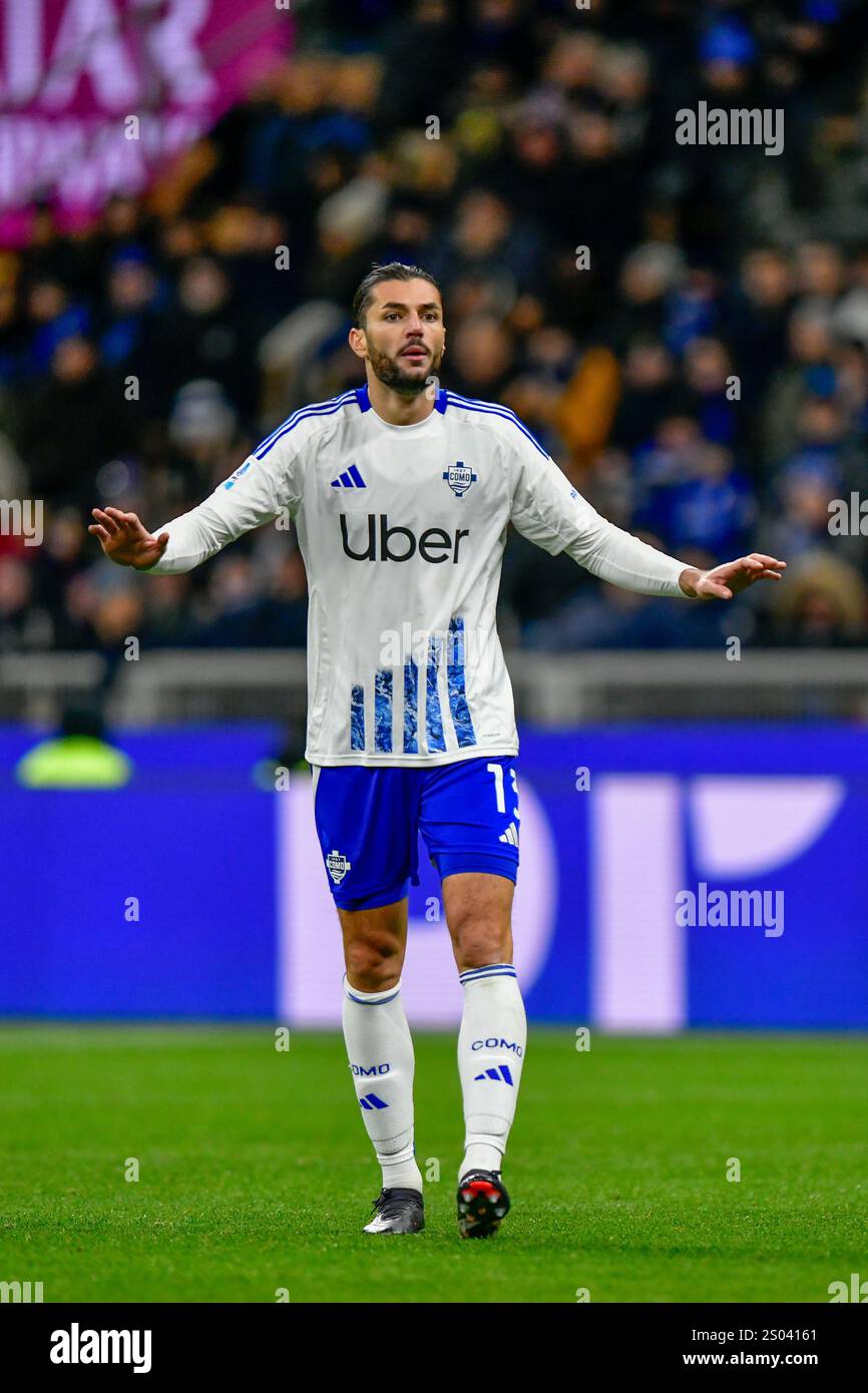 Milano, Italy. 23rd Dec, 2024. Alberto Dossena (13) of Como seen during ...