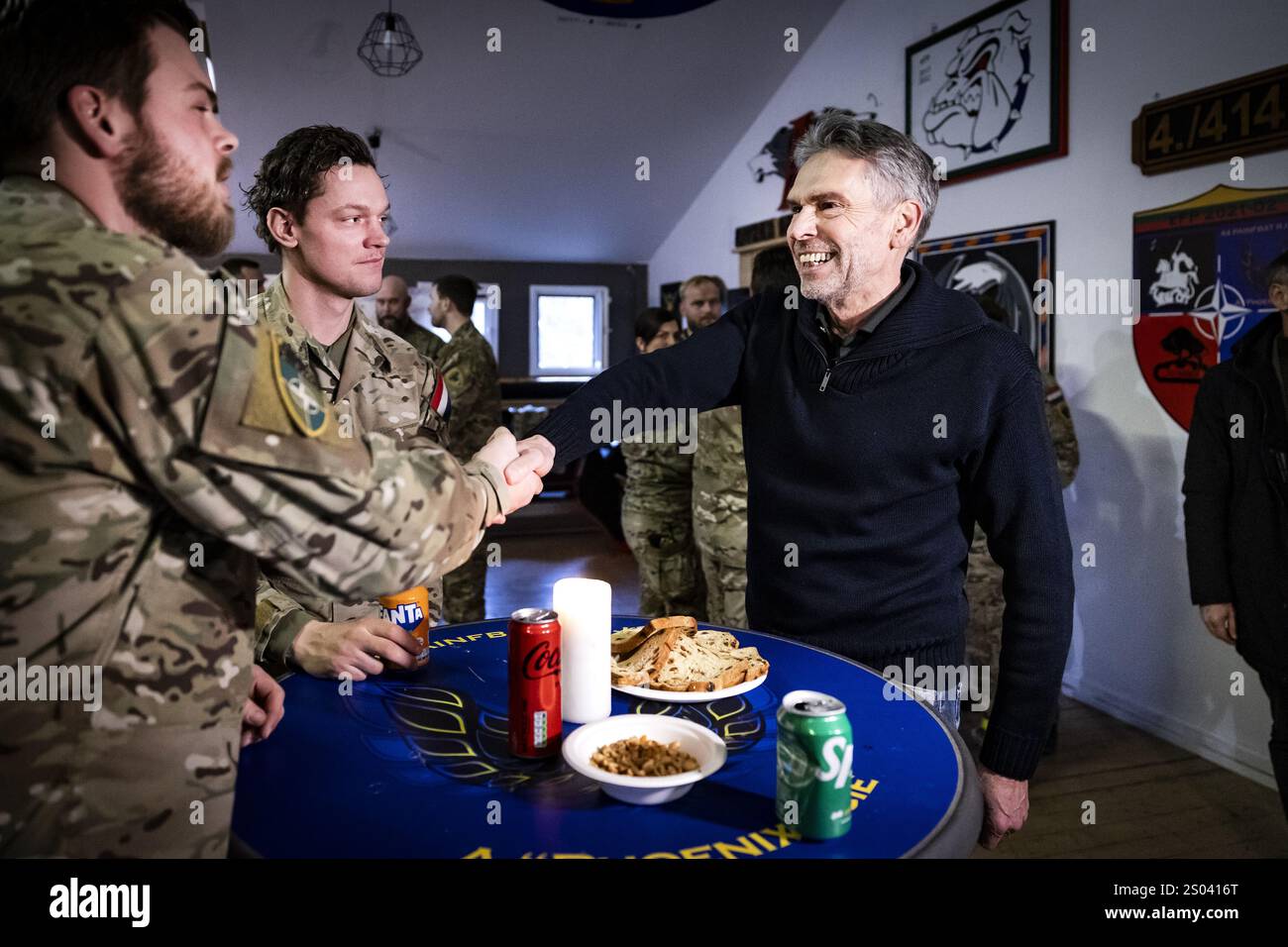 RUKLA - Prime Minister Dirk Schoof talks with Dutch military personnel ...