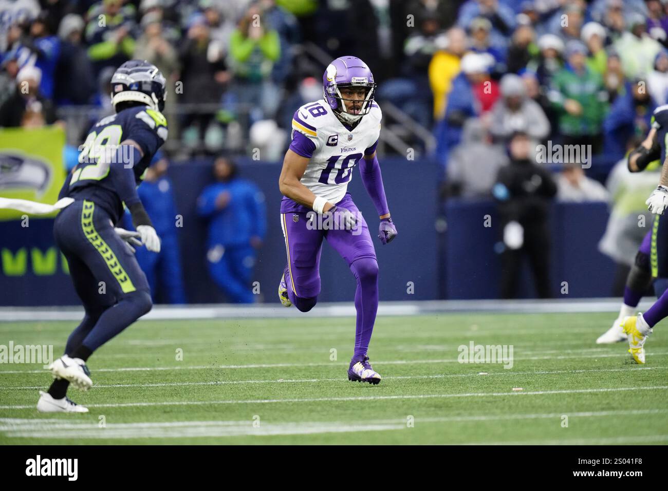 Minnesota Vikings wide receiver Justin Jefferson (18) runs down the field during an NFL football ...