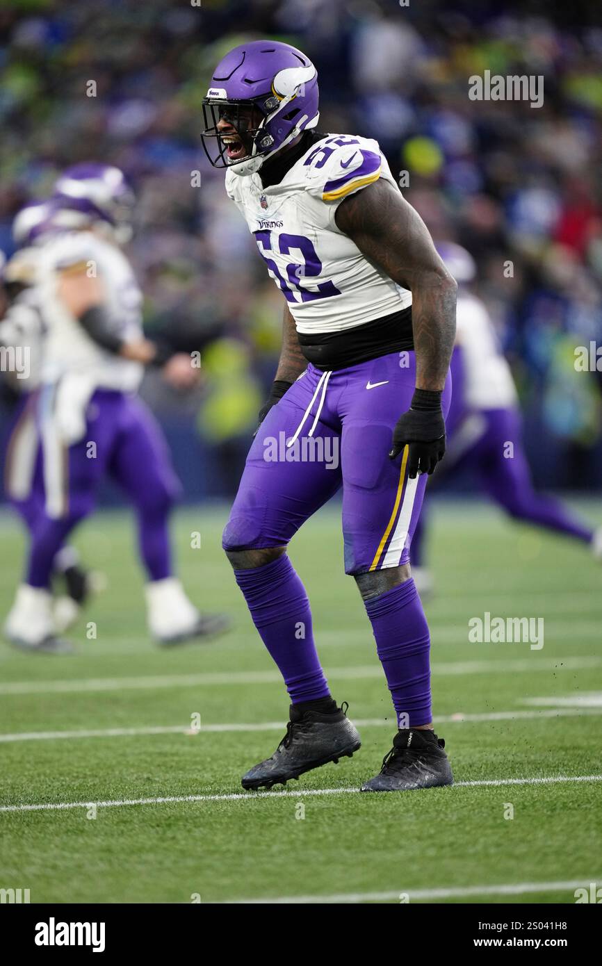 Minnesota Vikings linebacker Jihad Ward (52) looks on during an NFL ...