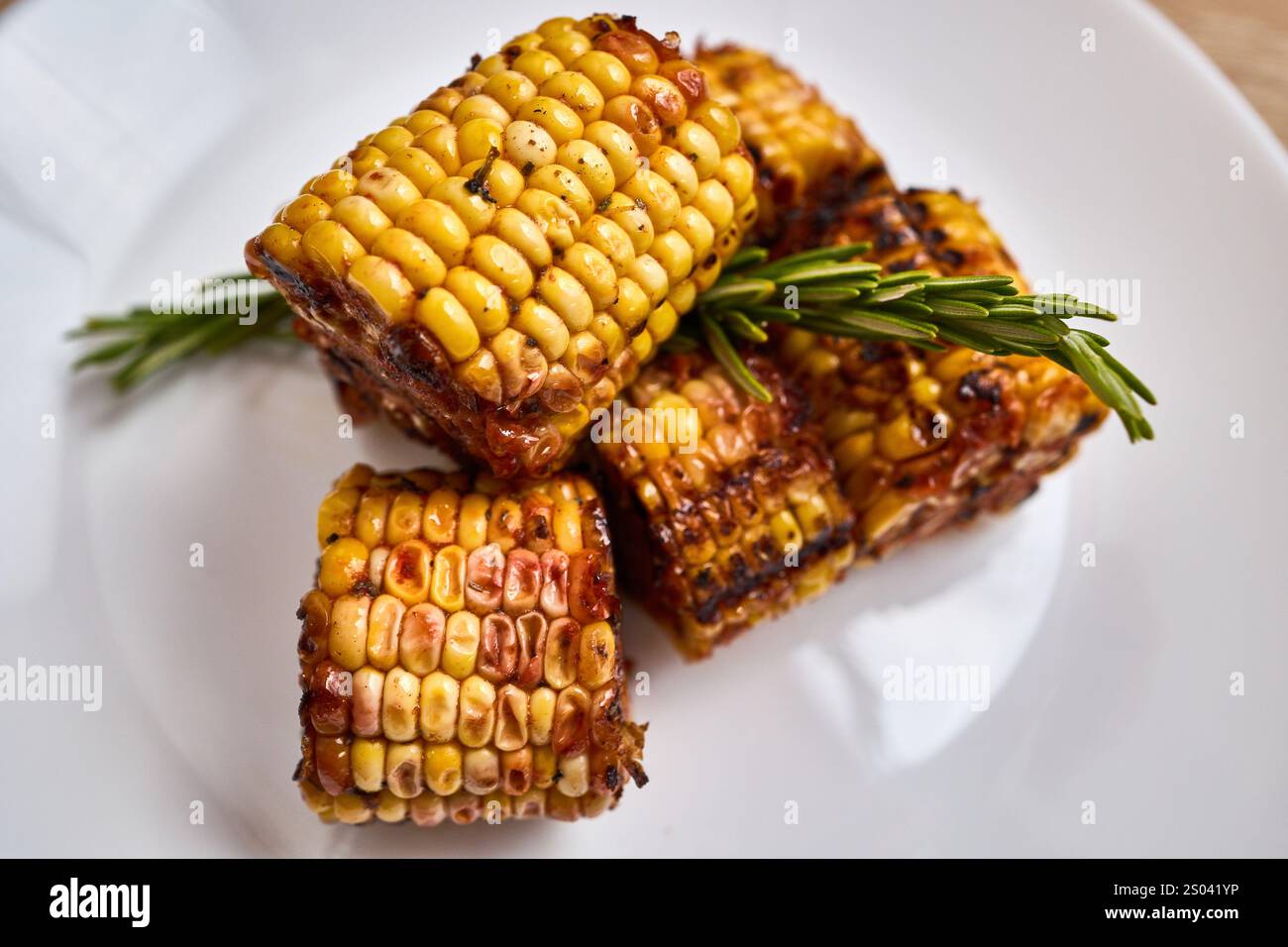 Sweetcorn cobs grilled to perfection and seasoned with fragrant herbs ...