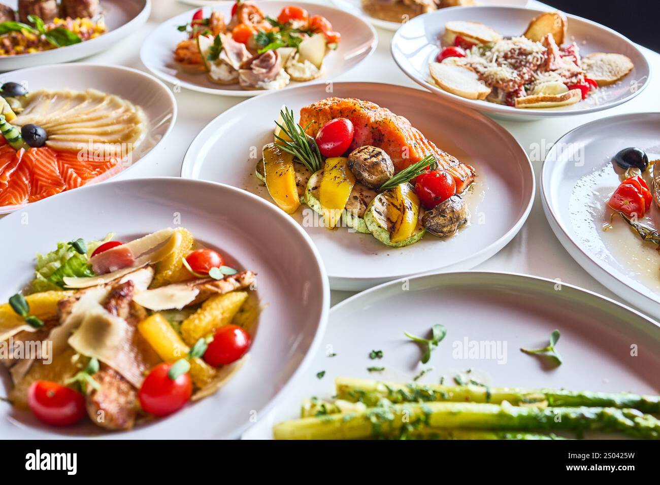 A table setting with a variety of gourmet dishes, offering a luxurious ...