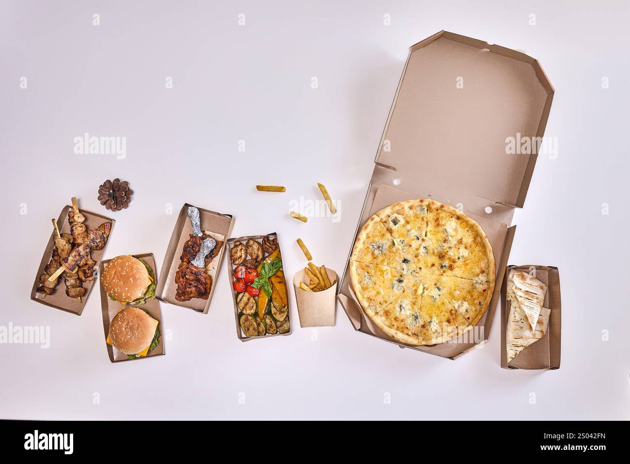 A selection of takeaway dishes representing various cuisines, packaged ...