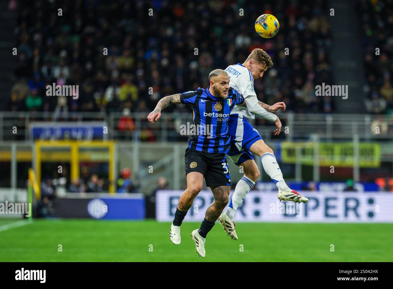 Milan, Italy. 23rd Dec, 2024. (L-R) Federico Dimarco of FC Internazionale seen in action with ...