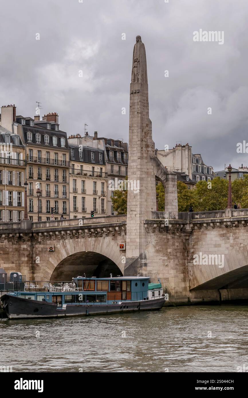 The statue of Saint Genevieve, patron saint of Paris, France, on the ...
