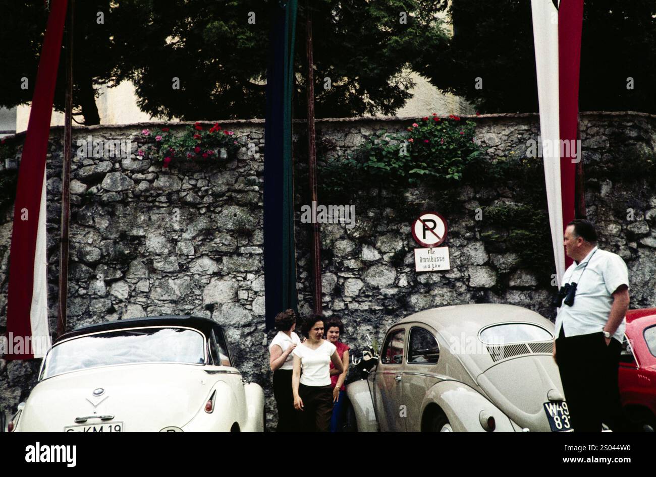BMW 502 and VW Volkswagen Beetle cars parked in bus parking place ...