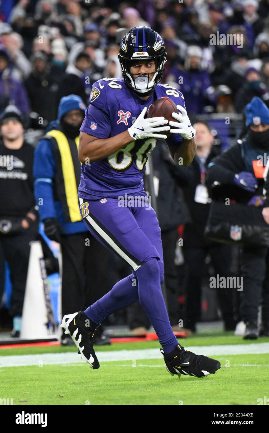 Baltimore Ravens tight end Isaiah Likely (80) catches the ball for a ...