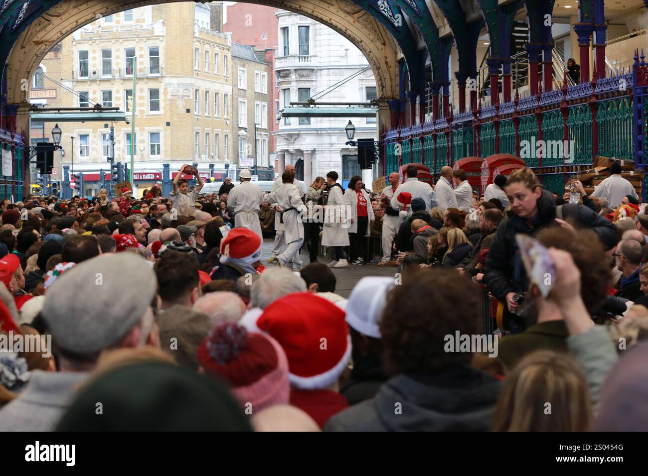 London, UK. 24 December 2024. Event goers during the Smithfield Market ...
