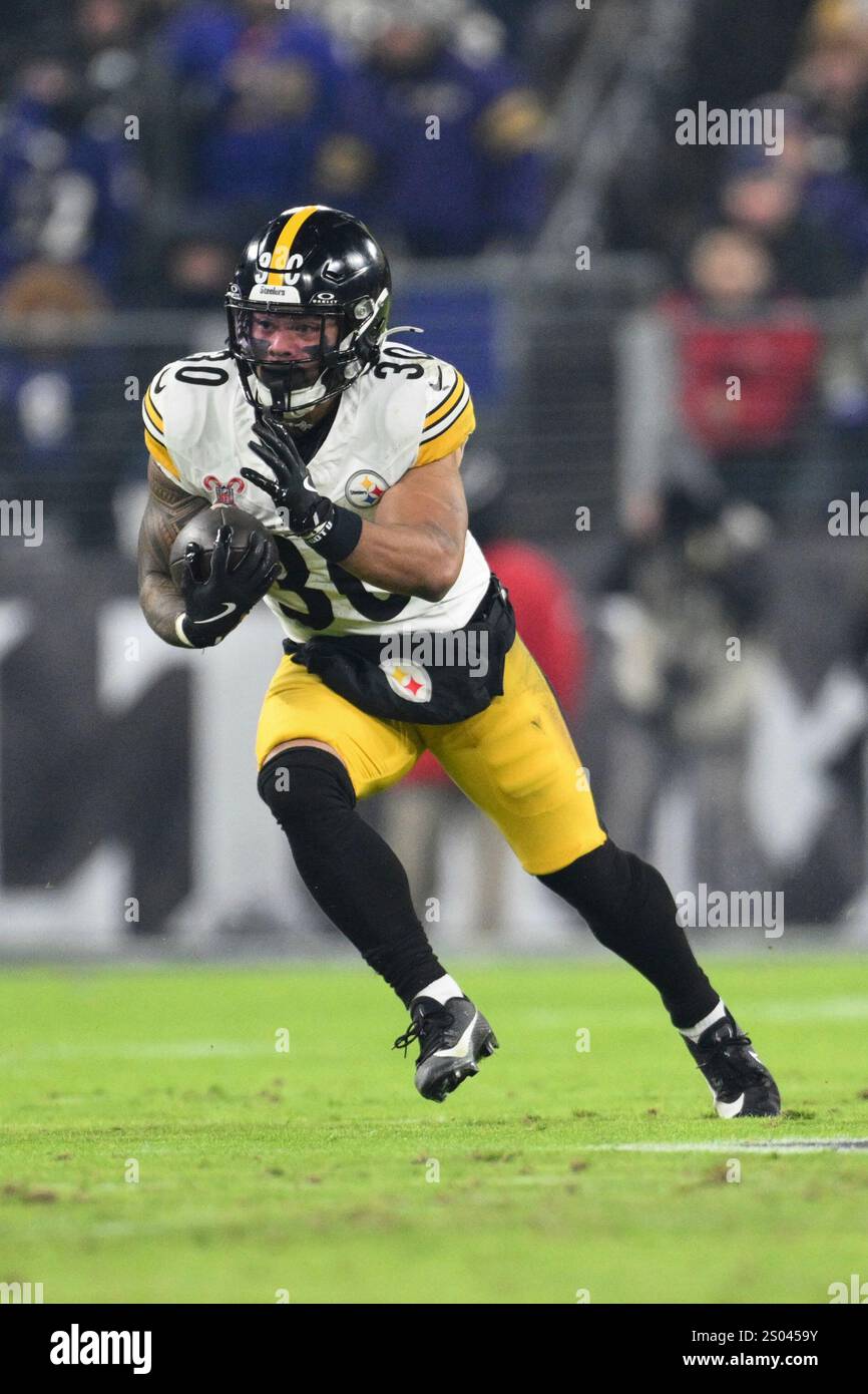 Pittsburgh Steelers running back Jaylen Warren (30) runs with the ball ...
