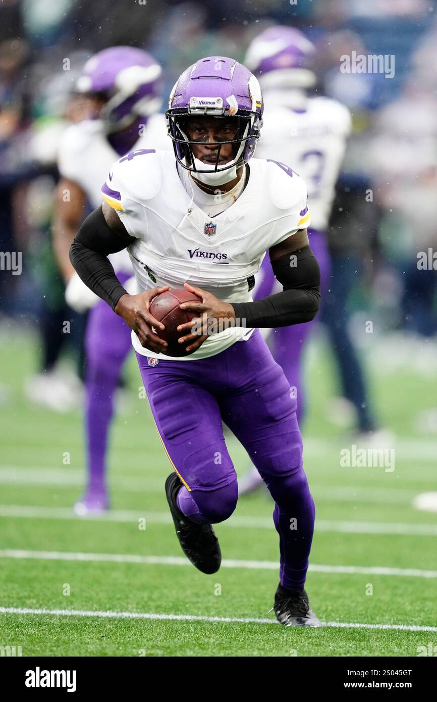 Minnesota Vikings wide receiver Brandon Powell (4) runs with the ball ...