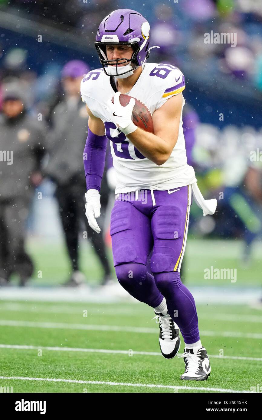 Minnesota Vikings tight end Johnny Mundt (86) runs with the ball before ...