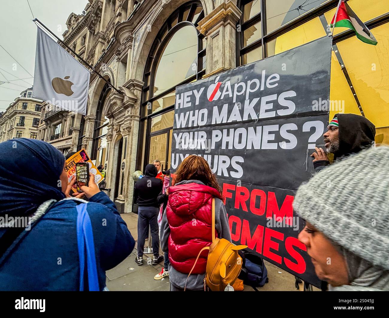 London, UK. 24th Dec, 2024. A protest outside the Apple store in Regent ...