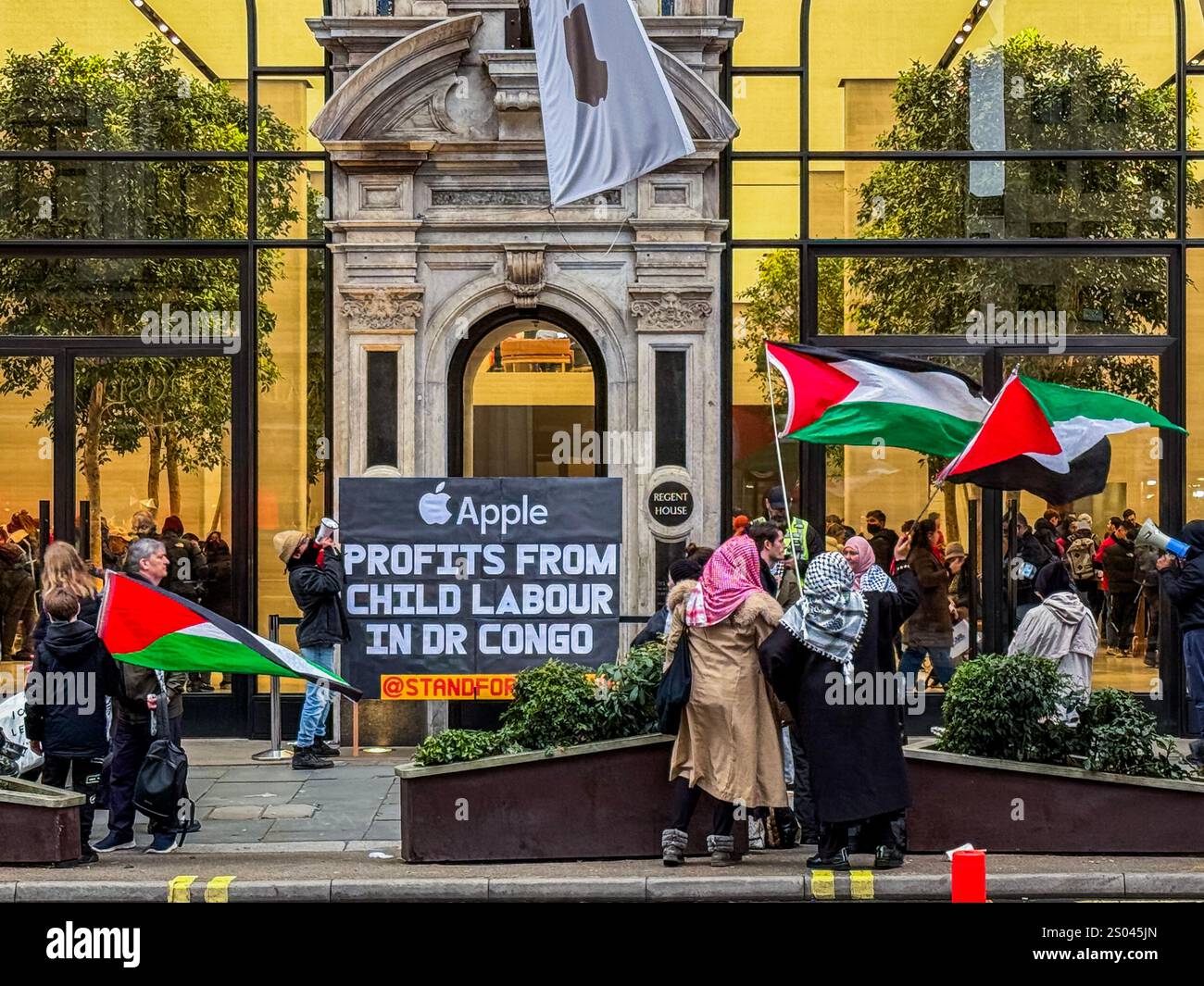 London, UK. 24th Dec, 2024. A protest outside the Apple store in Regent ...