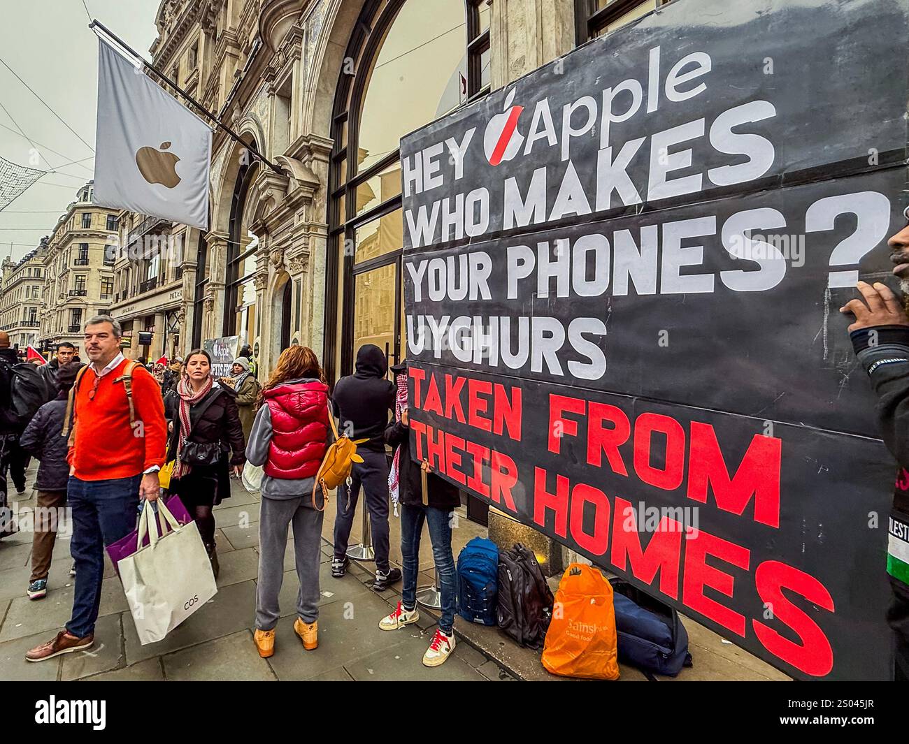 London, UK. 24th Dec, 2024. A protest outside the Apple store in Regent ...