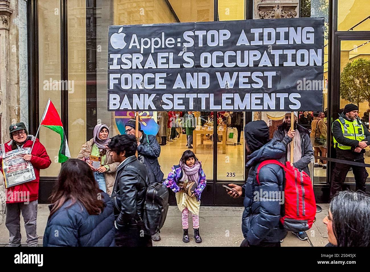London, UK. 24th Dec, 2024. A protest outside the Apple store in Regent ...
