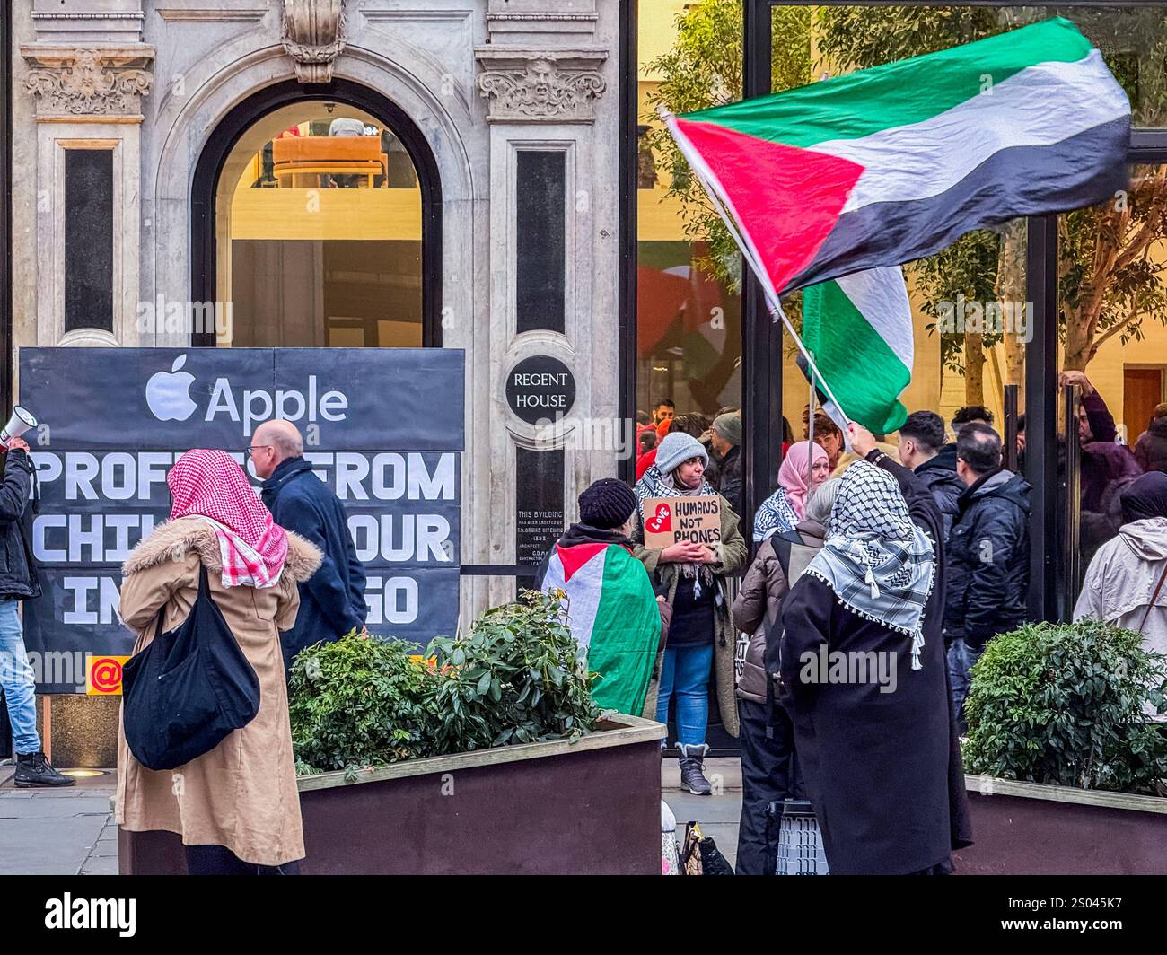 London, UK. 24th Dec, 2024. A protest outside the Apple store in Regent ...