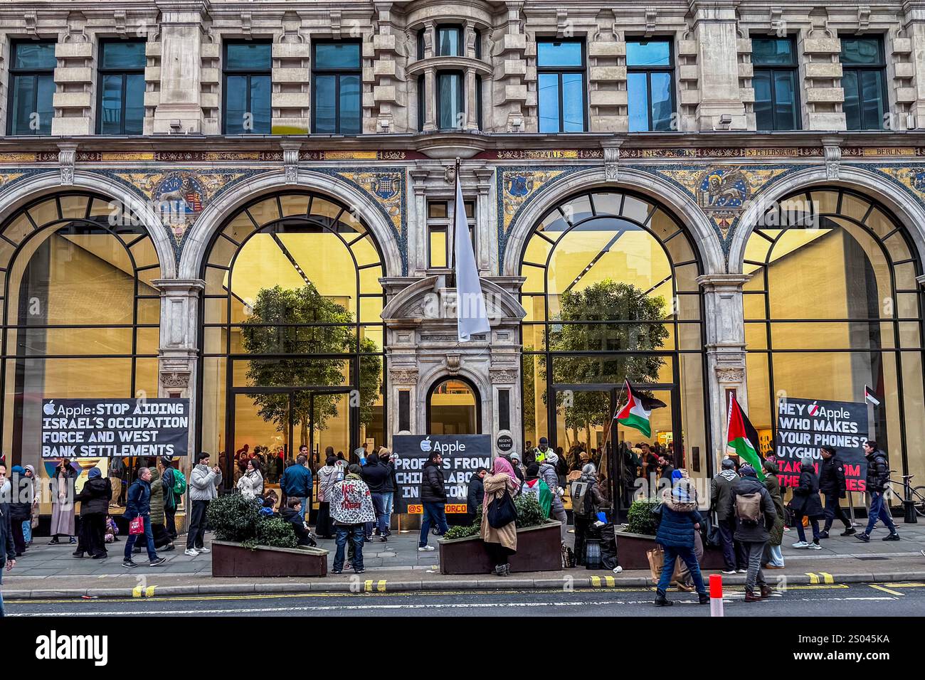 London, UK. 24th Dec, 2024. A protest outside the Apple store in Regent ...