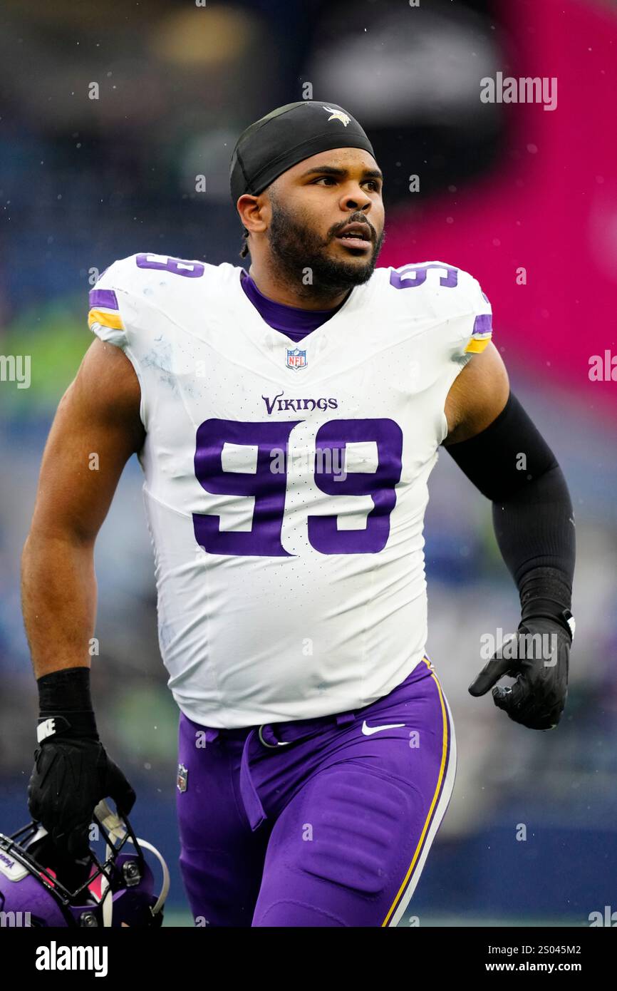 Minnesota Vikings defensive tackle Jerry Tillery (99) runs off the ...
