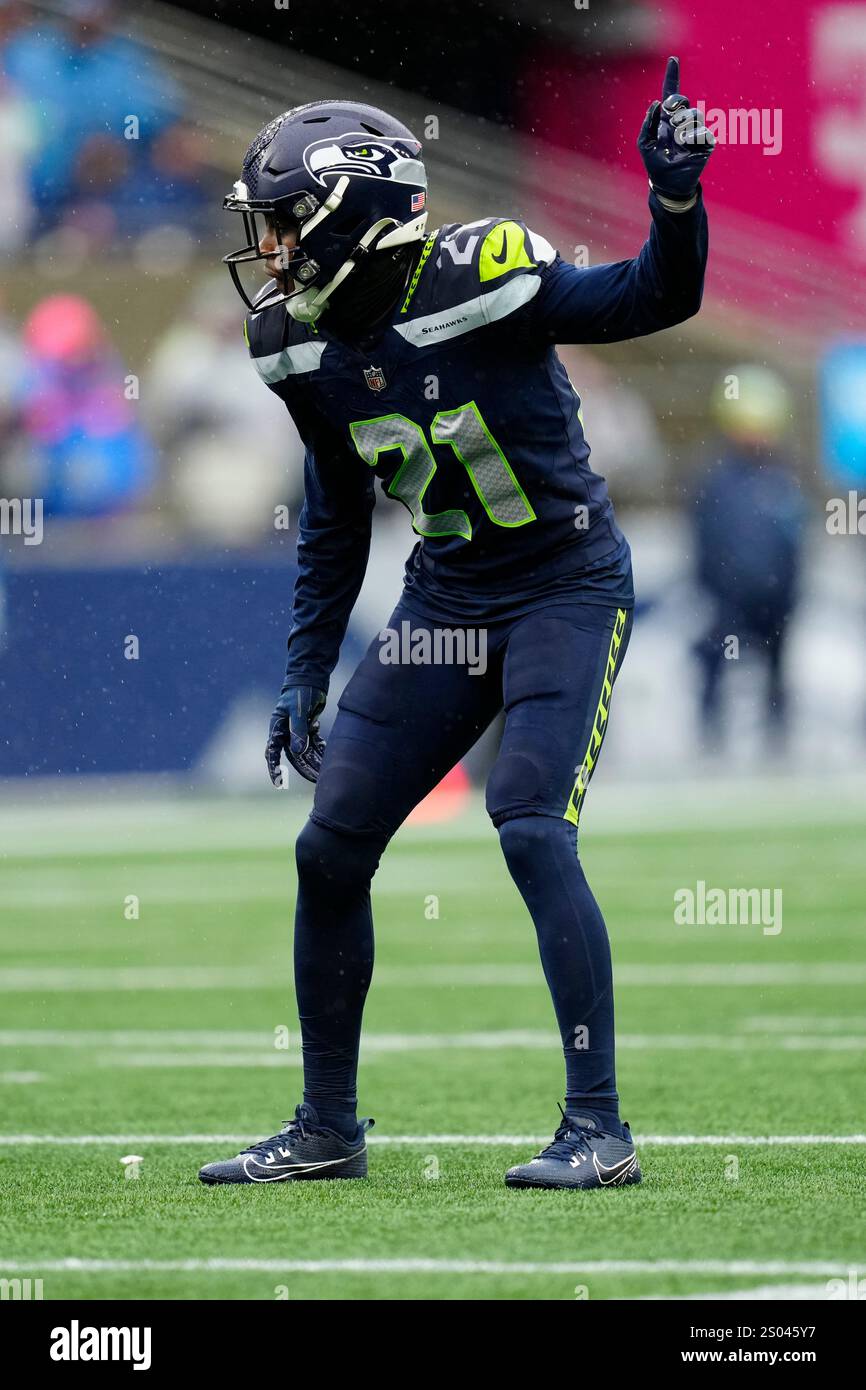 Seattle Seahawks cornerback Devon Witherspoon (21) gets set during an ...