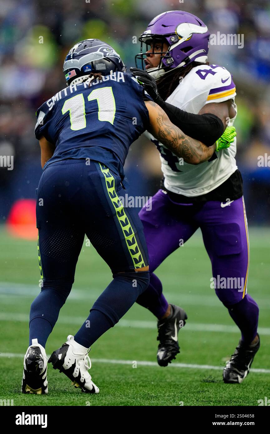 Seattle Seahawks wide receiver Jaxon Smith-Njigba (11) and Minnesota ...
