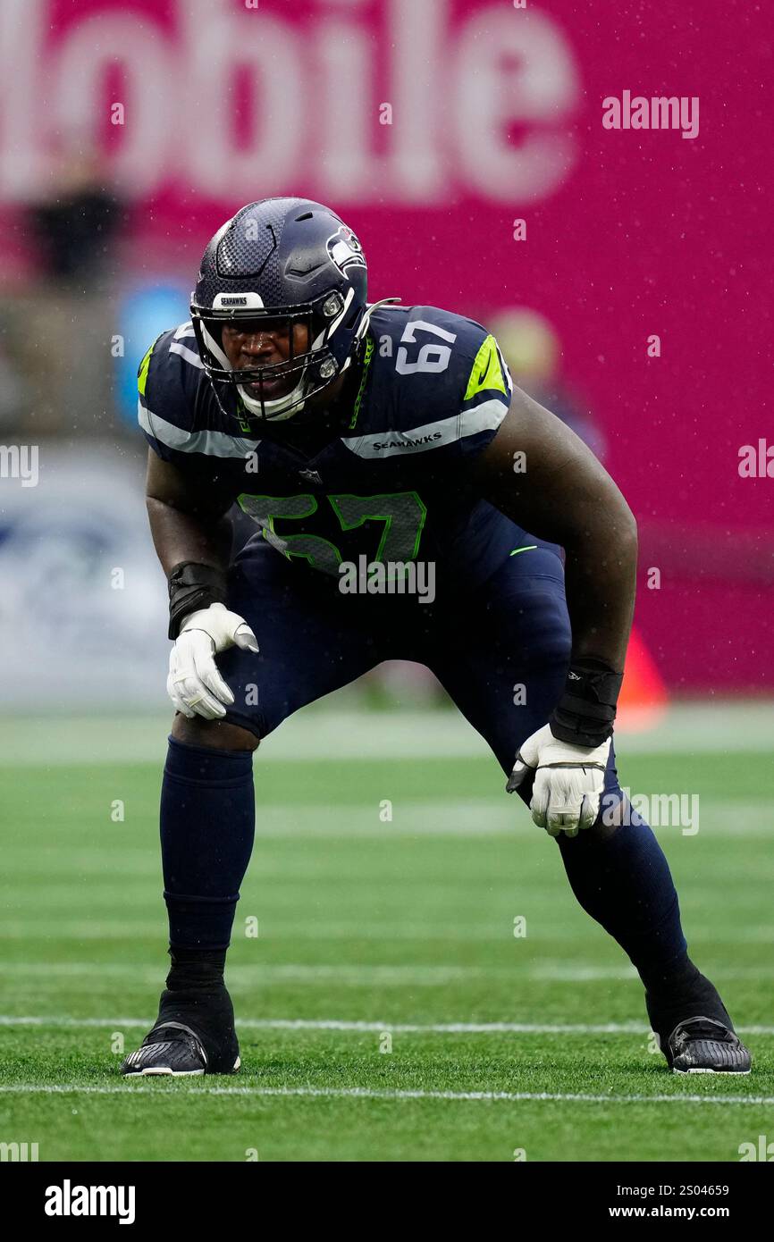 Seattle Seahawks offensive tackle Charles Cross (67) gets set during an ...
