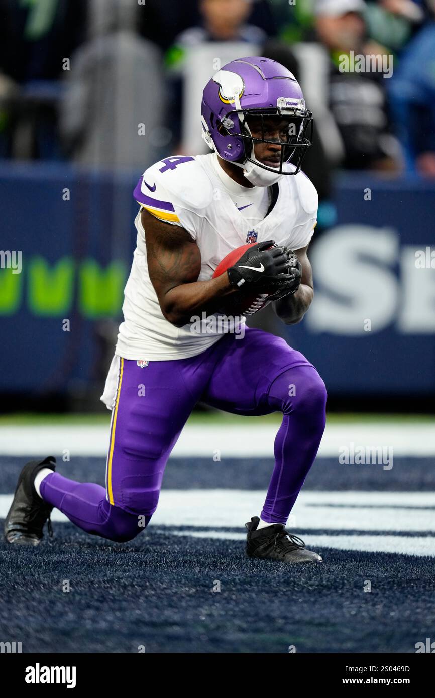 Minnesota Vikings wide receiver Brandon Powell (4) kneels for a ...