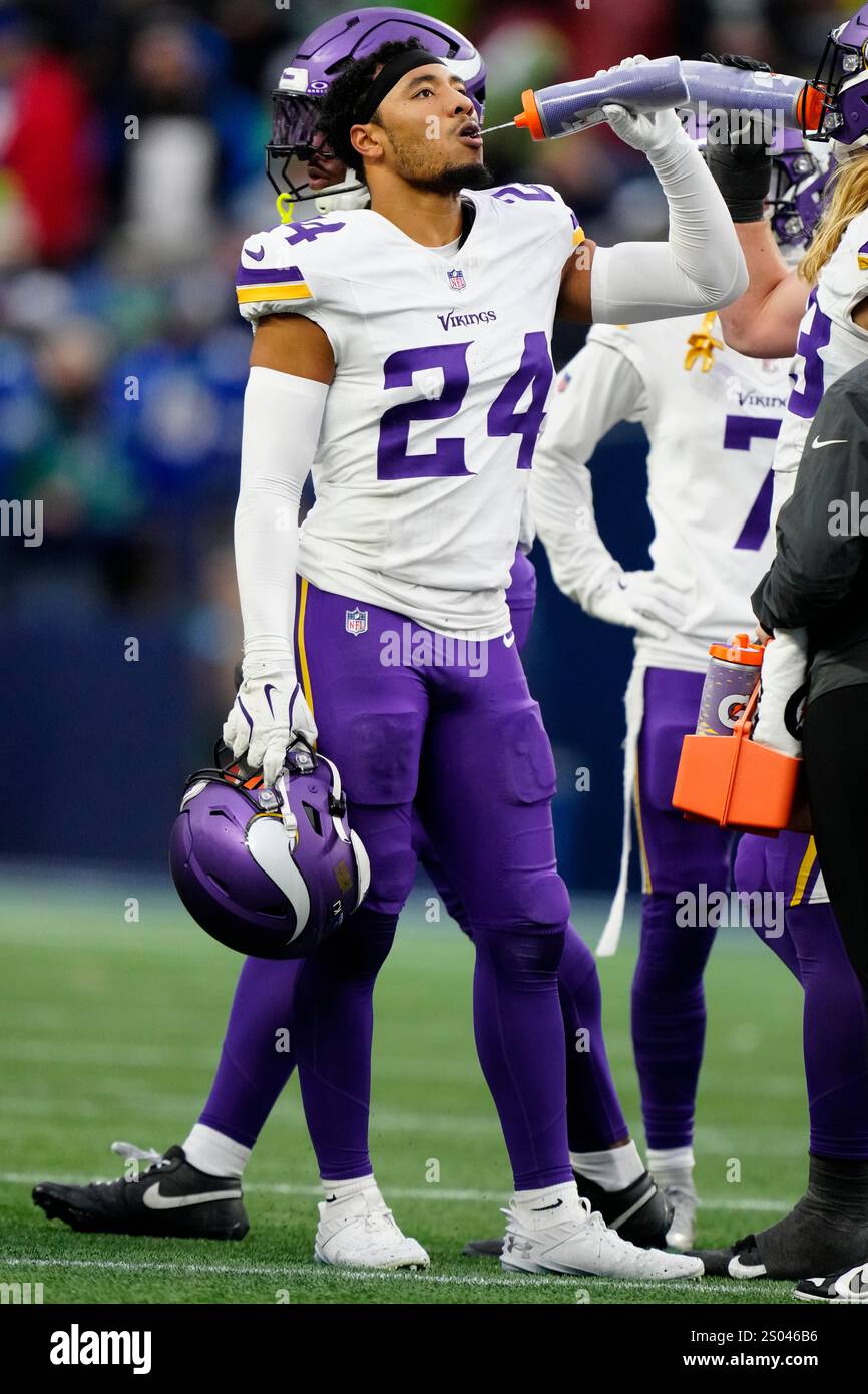 Minnesota Vikings safety Camryn Bynum (24) drinks water from a Gatorade ...