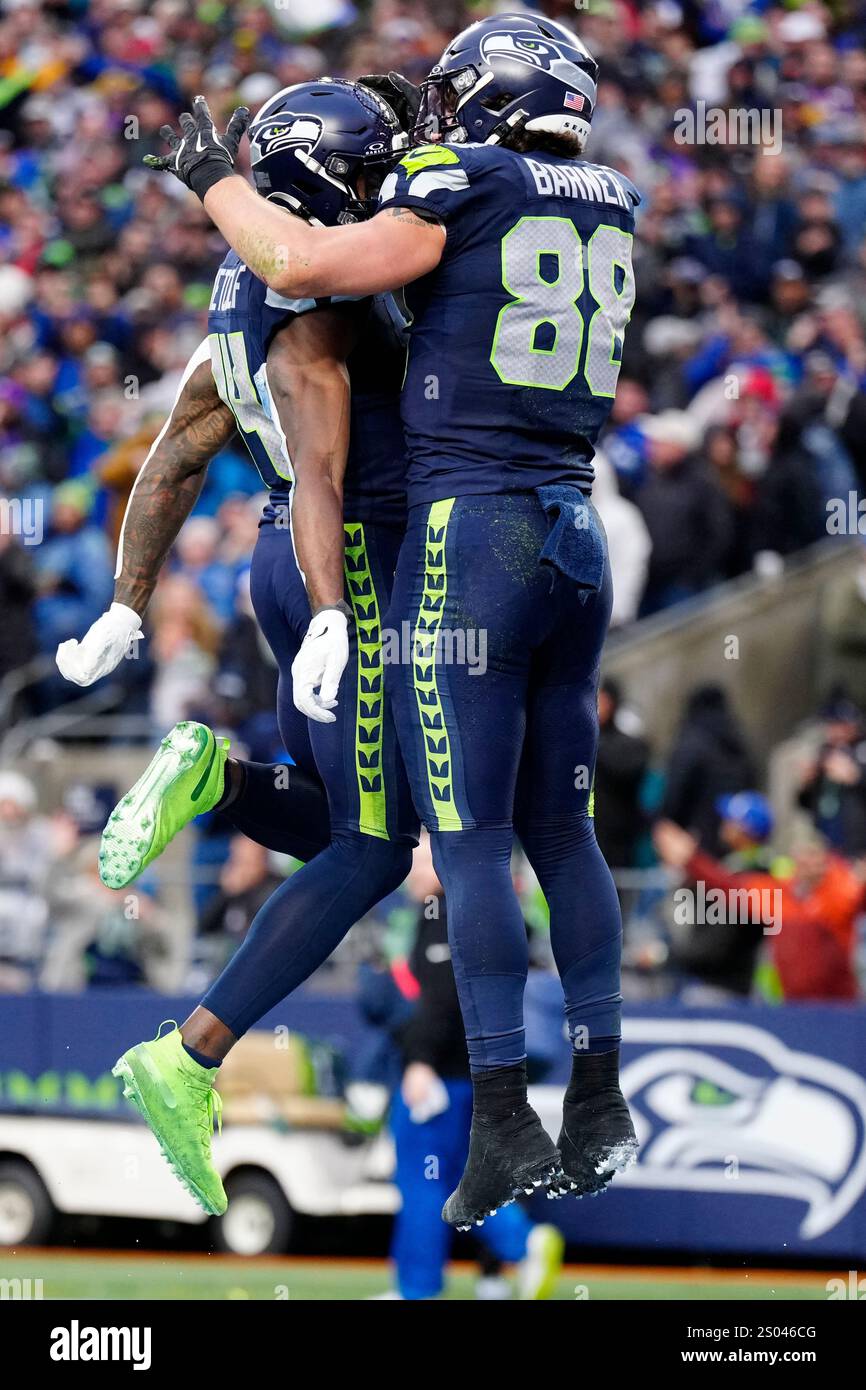 Seattle Seahawks tight end AJ Barner (88) celebrates after scoring a ...