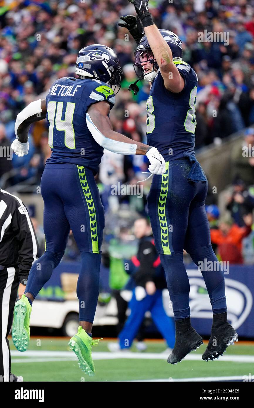 Seattle Seahawks tight end AJ Barner (88) celebrates after scoring a ...