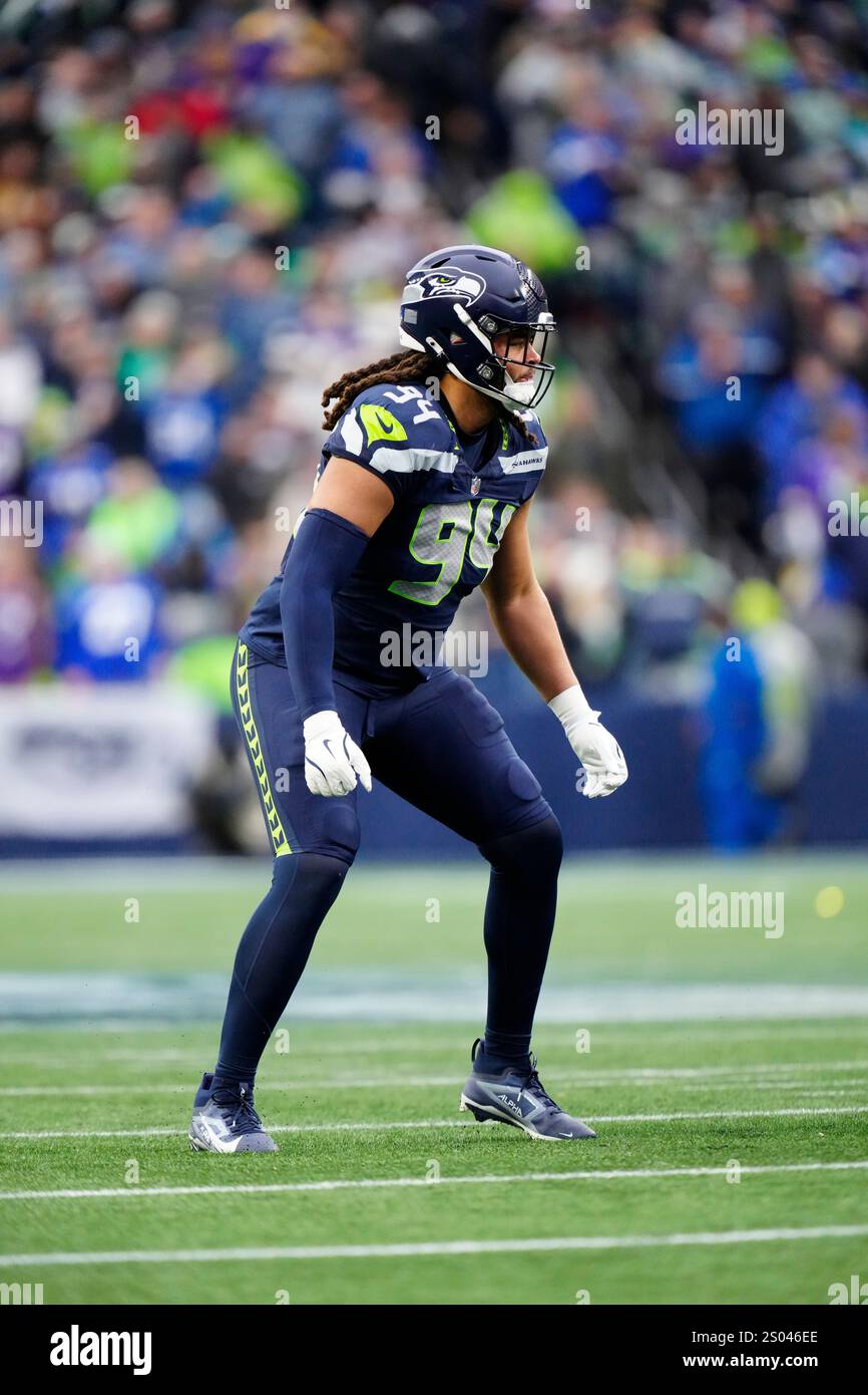 Seattle Seahawks defensive end Mike Morris (94) gets set during an NFL football game against the ...