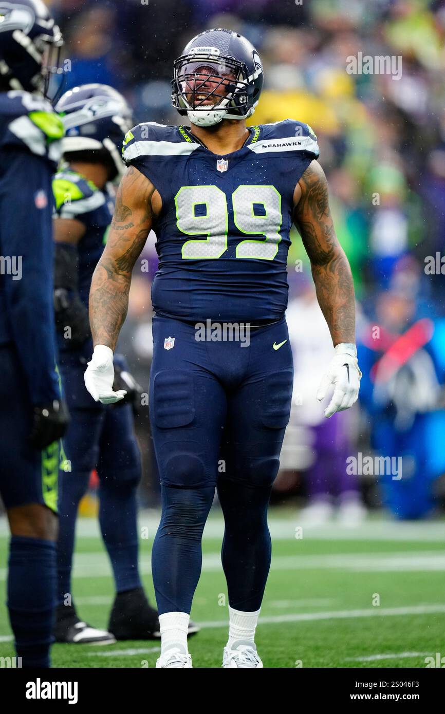 Seattle Seahawks defensive end Leonard Williams (99) looks on during an ...