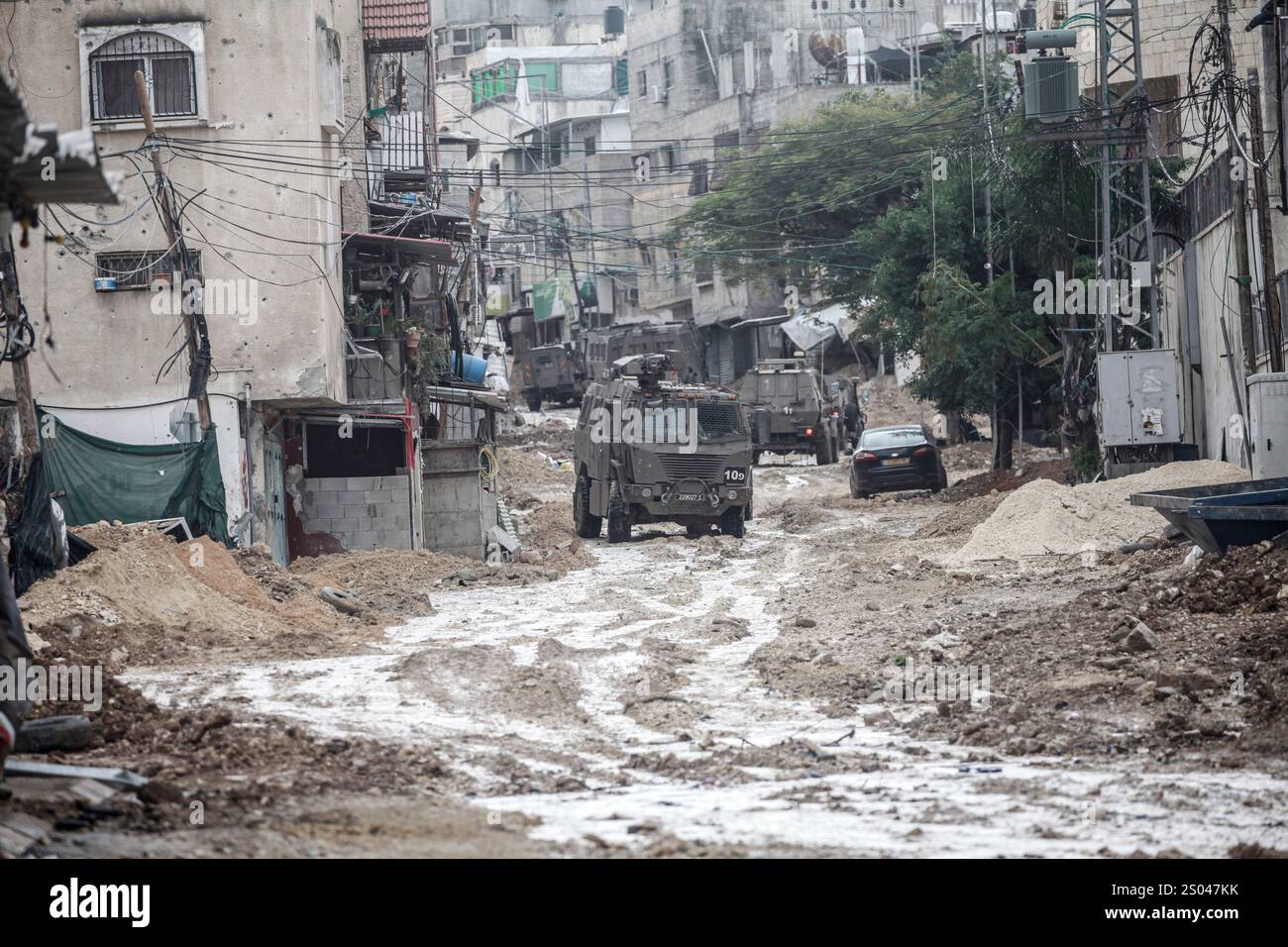 Tulkarm, Palestine. 24th Dec, 2024. Israeli military vehicles seen ...