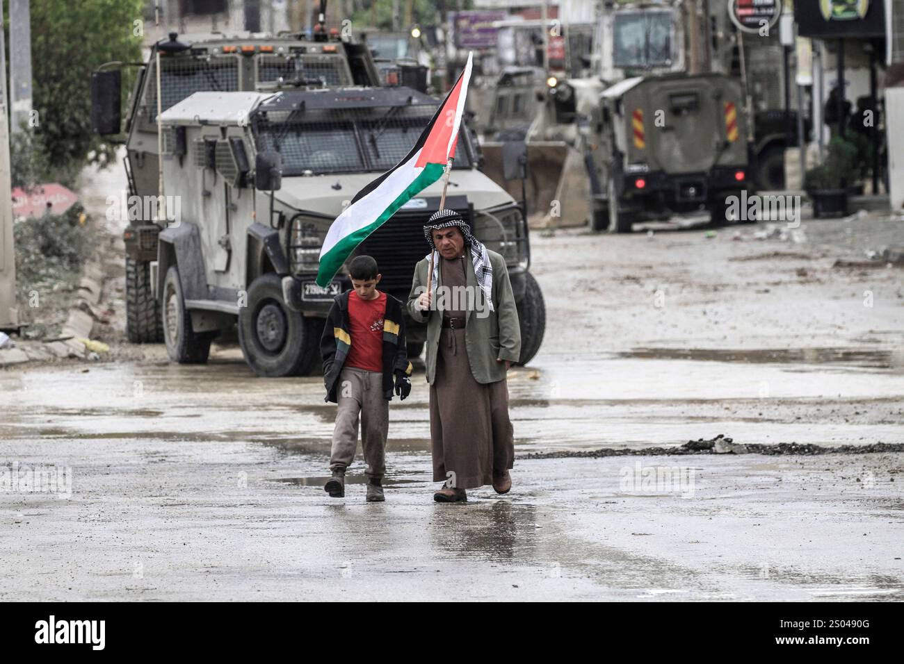 Tulkarm, Palestine. 24th Dec, 2024. An elderly Palestinian man with a ...