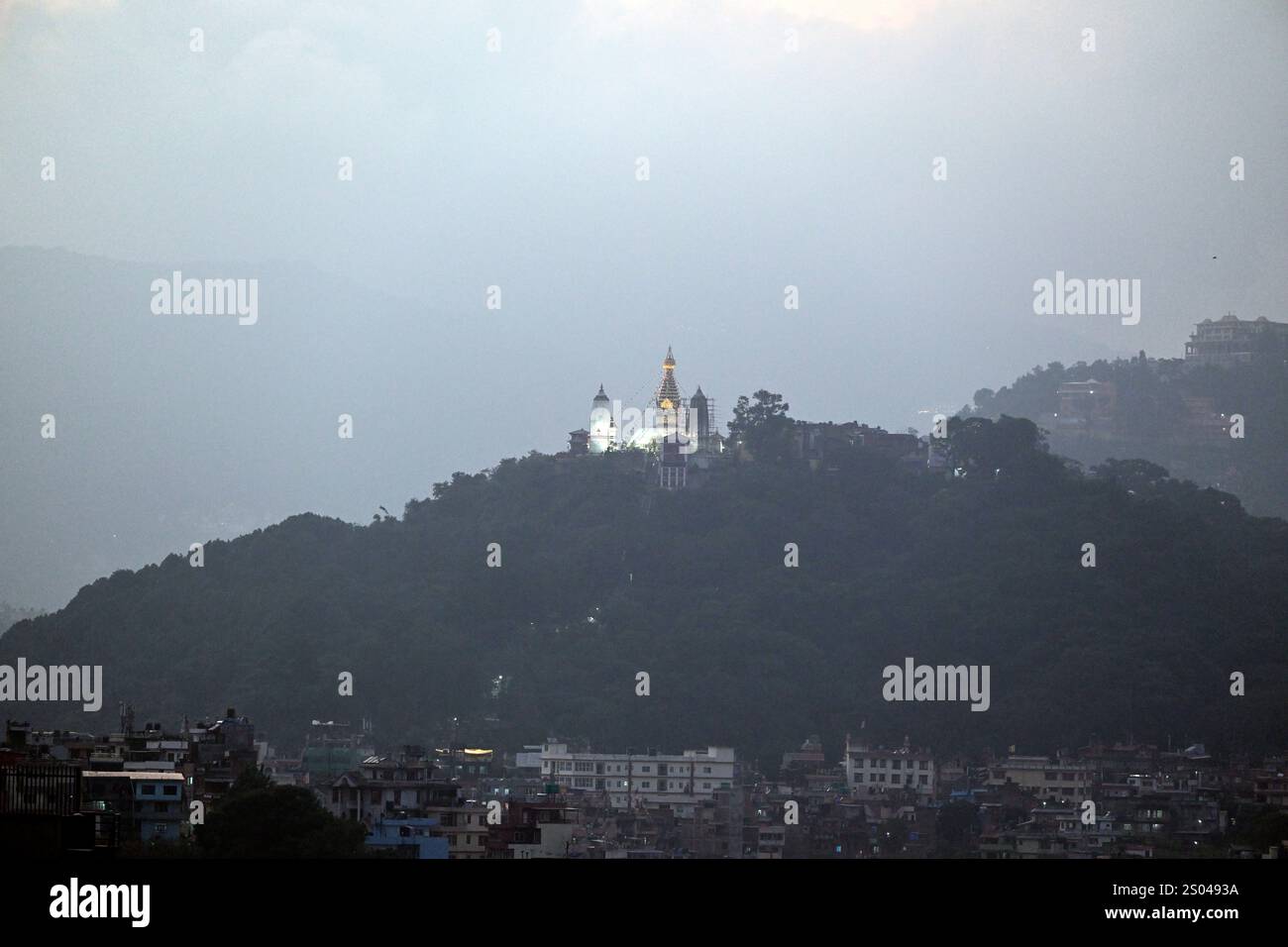 A hilltop Hindu temple at sunset in Kathmandu, Nepal Stock Photo - Alamy
