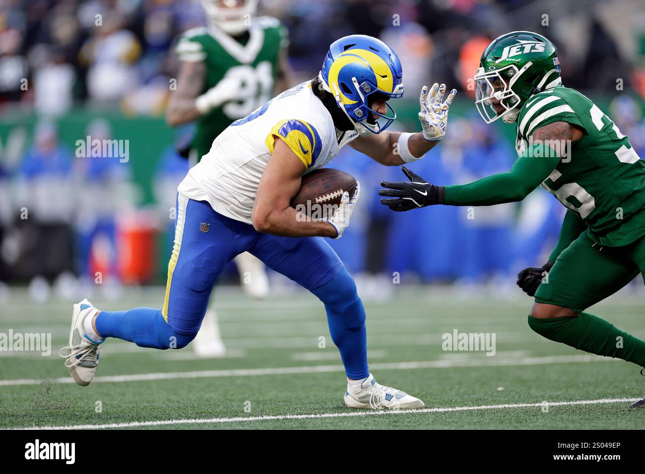Los Angeles Rams wide receiver Puka Nacua (17) is tackled by New York ...