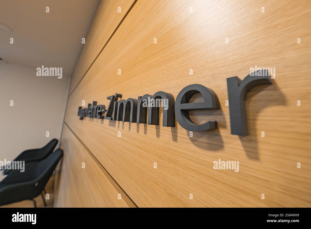 Close-up of the wooden wall with lettering in a stylish interior ...