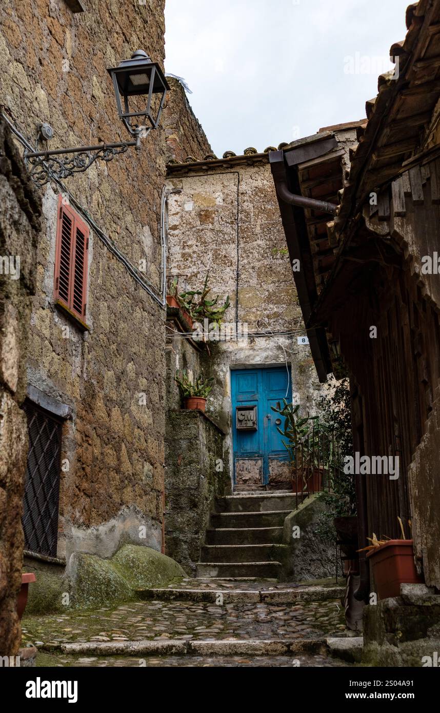 Ancient village alley, Calcata, Italy Stock Photo - Alamy