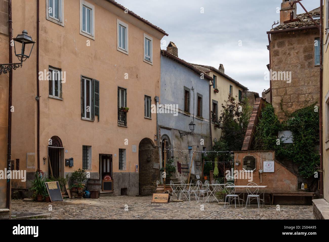 Ancient village alley, Calcata, Italy Stock Photo - Alamy