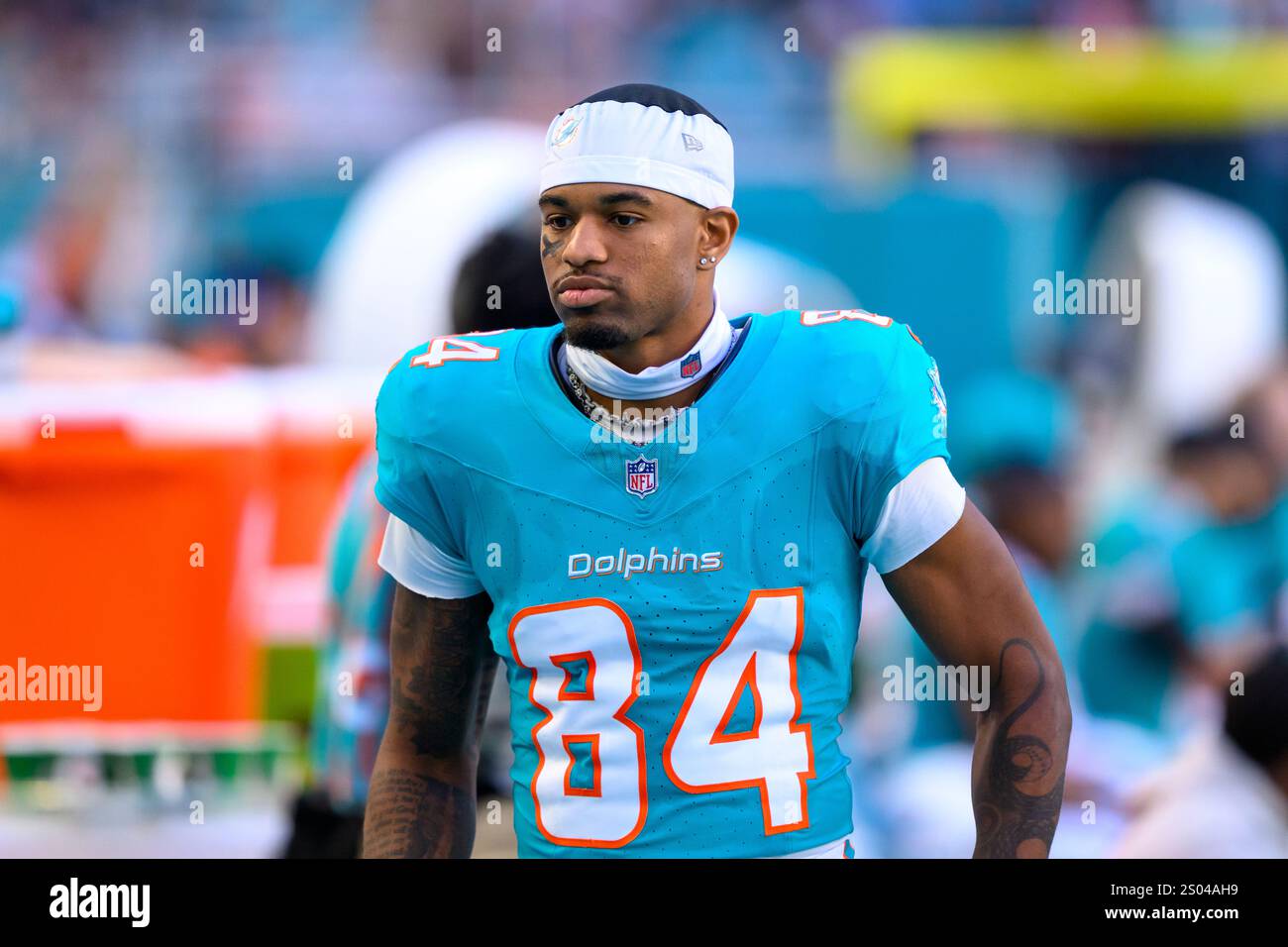 Miami Dolphins wide receiver Erik Ezukanma (84) stands on the sidelines ...